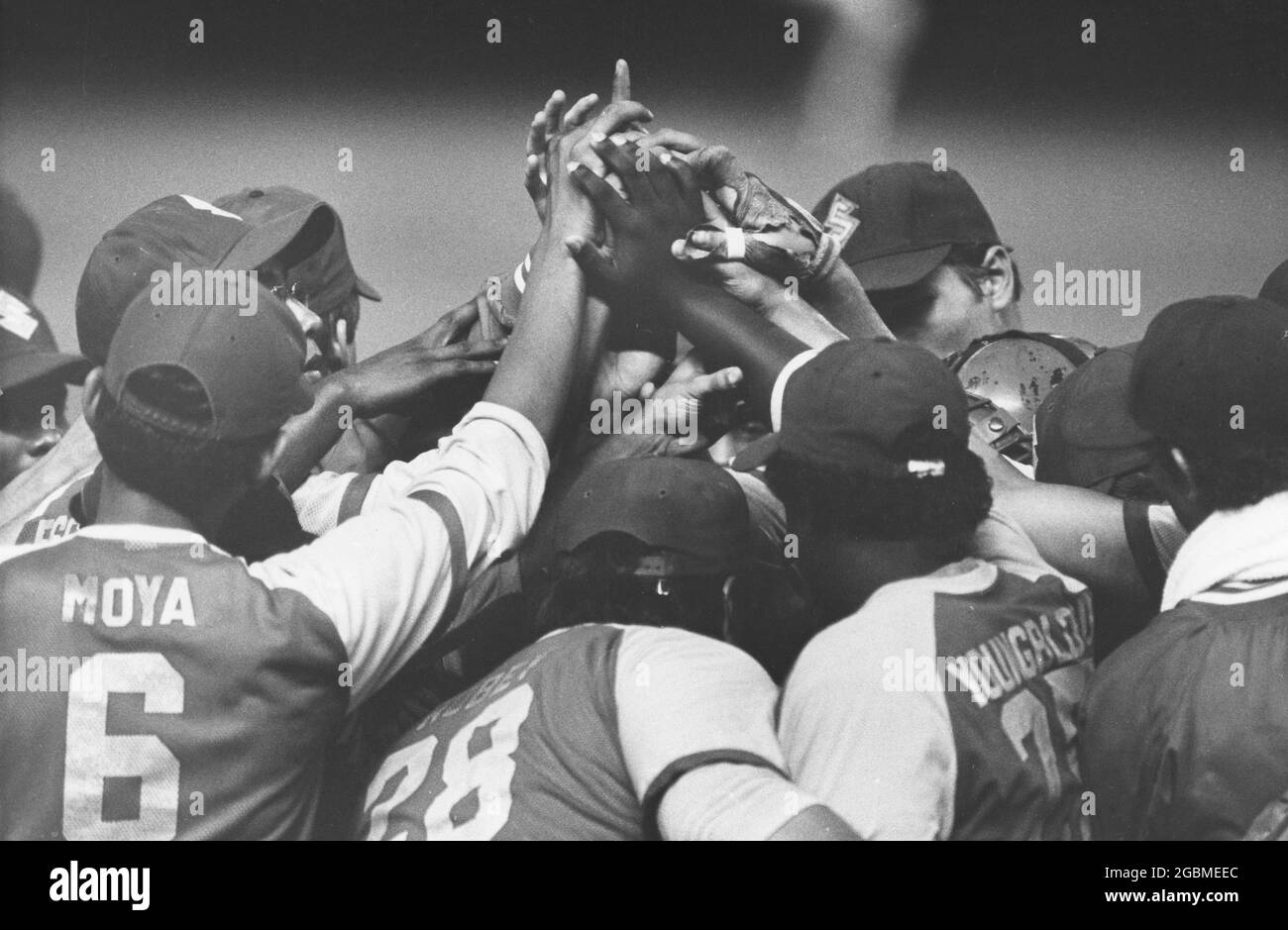 Austin, Texas USA, circa 1989: Members of college baseball team gather ...