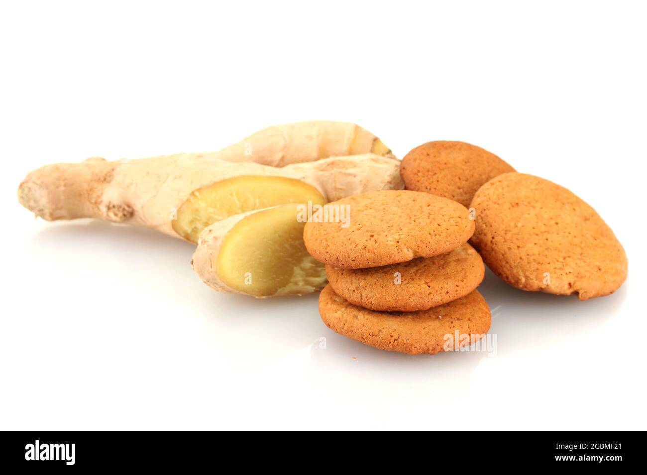 Ginger cookies with fresh ginger root isolated on white Stock Photo - Alamy