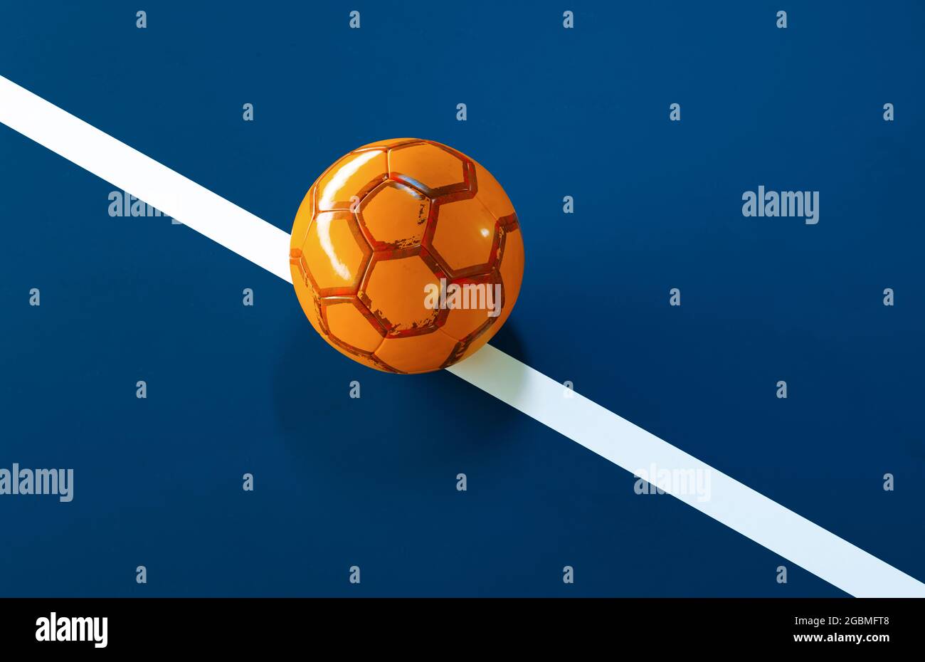 Orange futsal ball with light glow on the line of a blue indoor soccer ...