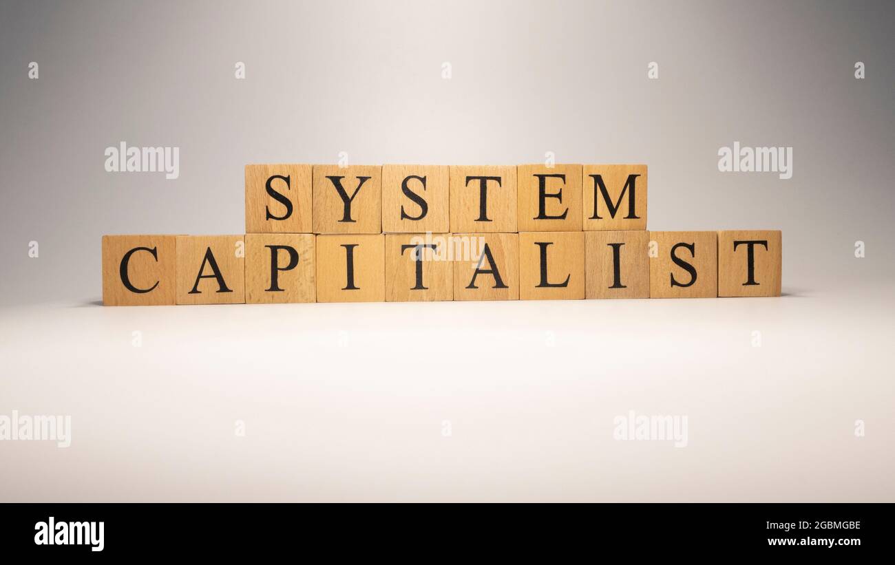 The name Capitalist system was created from wooden letter cubes ...