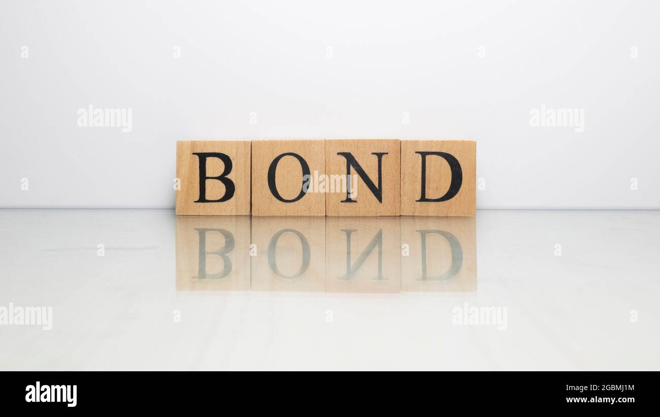 The name Bond was created from wooden letter cubes. finance and economy ...