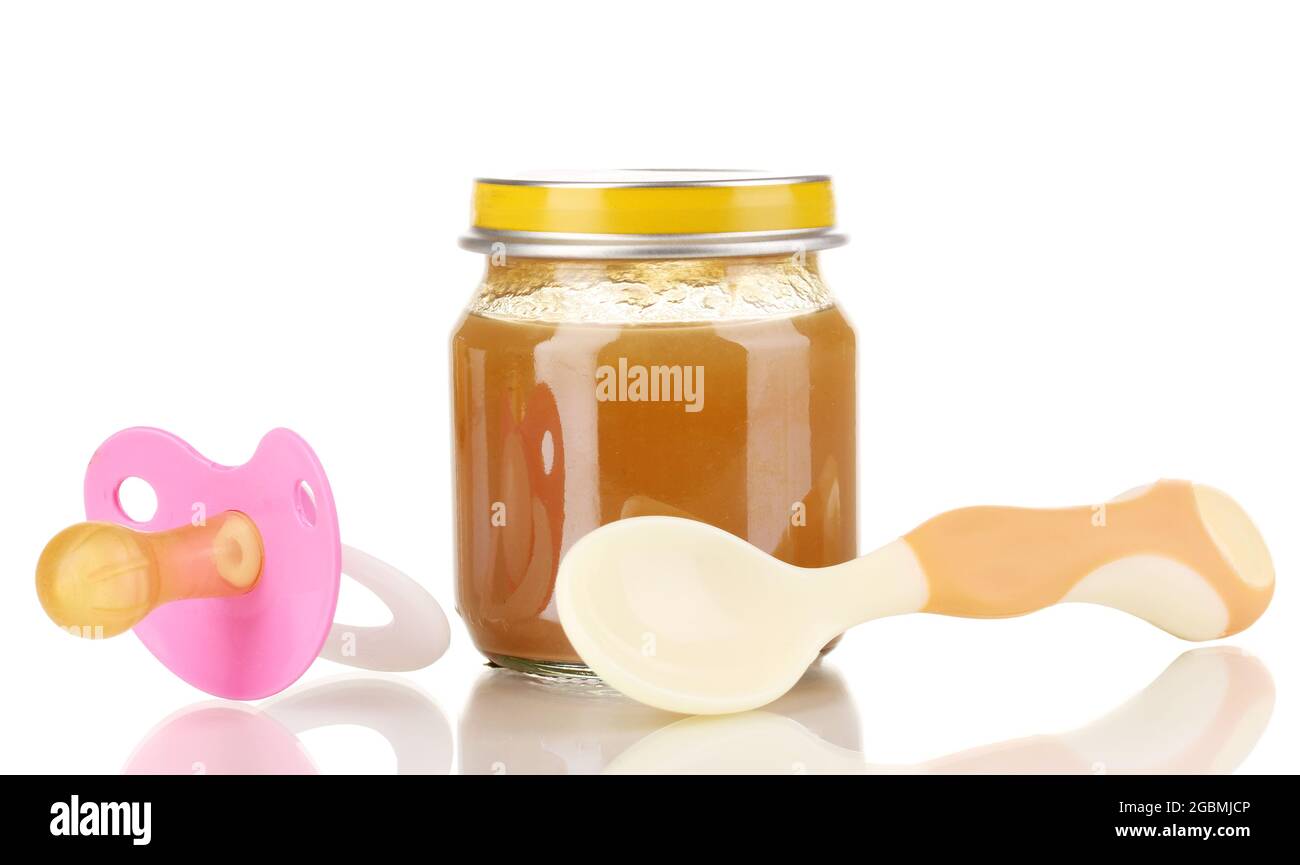 Useful and tasty baby food with beige small spoon isolated on white ...