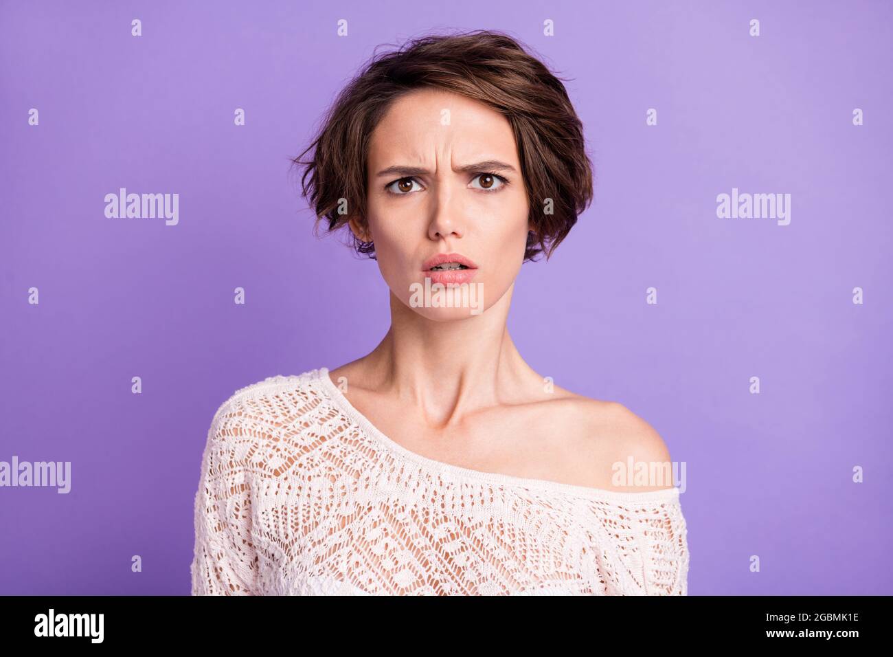 Photo of nice hairdo unsatisfied young girl sullen face look curious ...