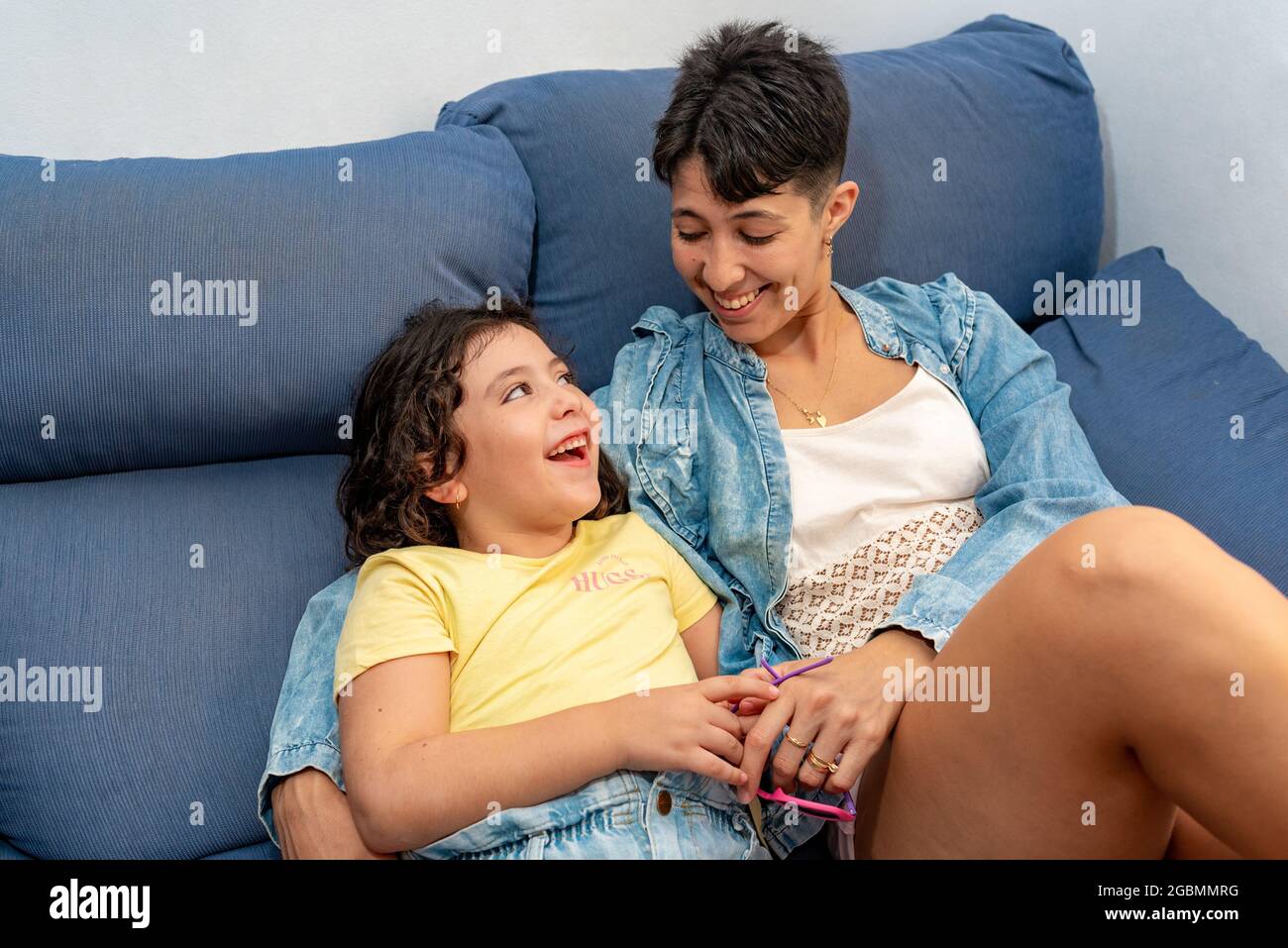 Hispanic mother with young kids hi-res stock photography and images - Alamy