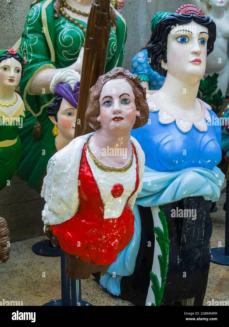 Display of traditional figureheads in the Cutty Sark, a British clipper ...