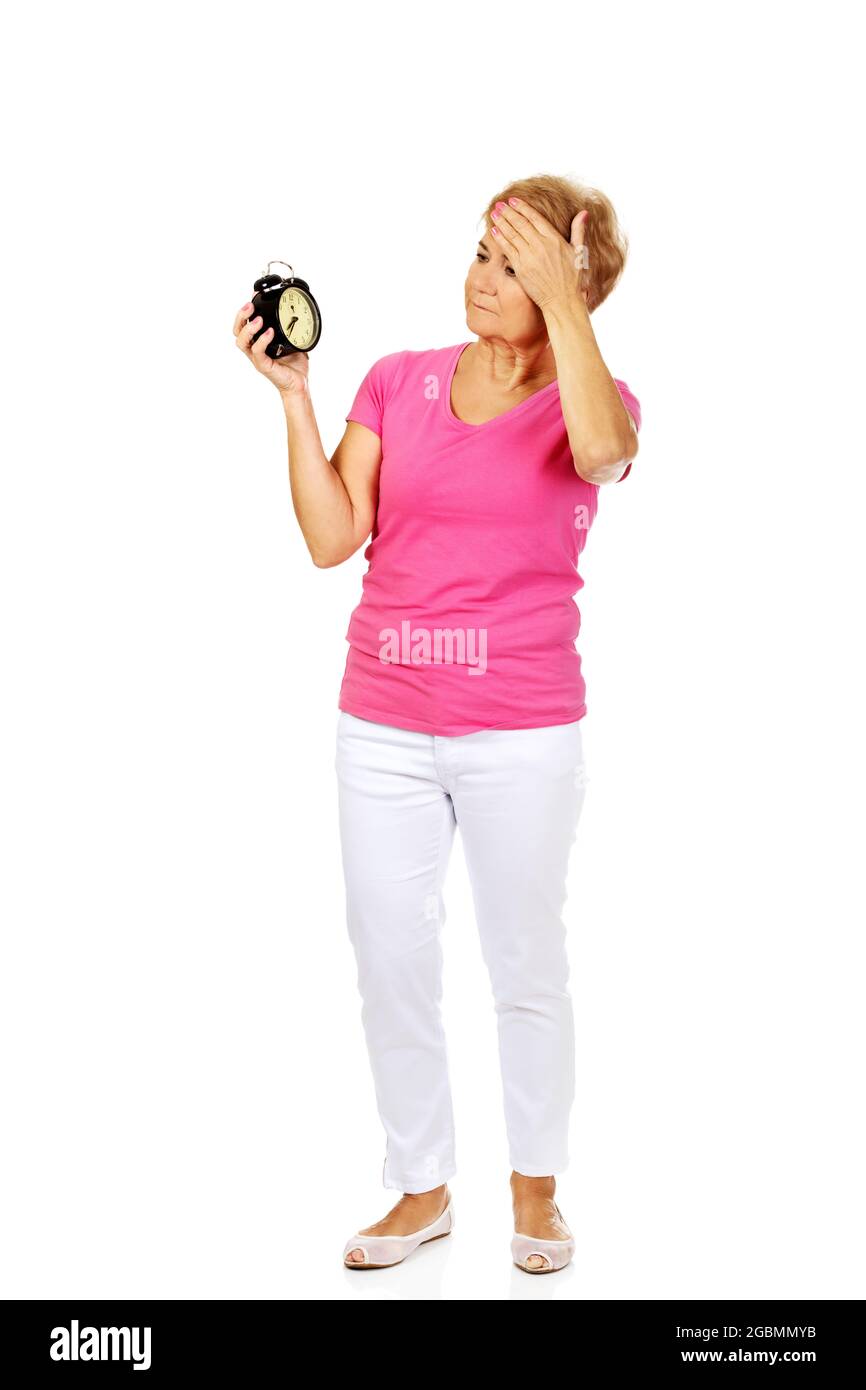 Mature woman clock Cut Out Stock Images & Pictures - Alamy