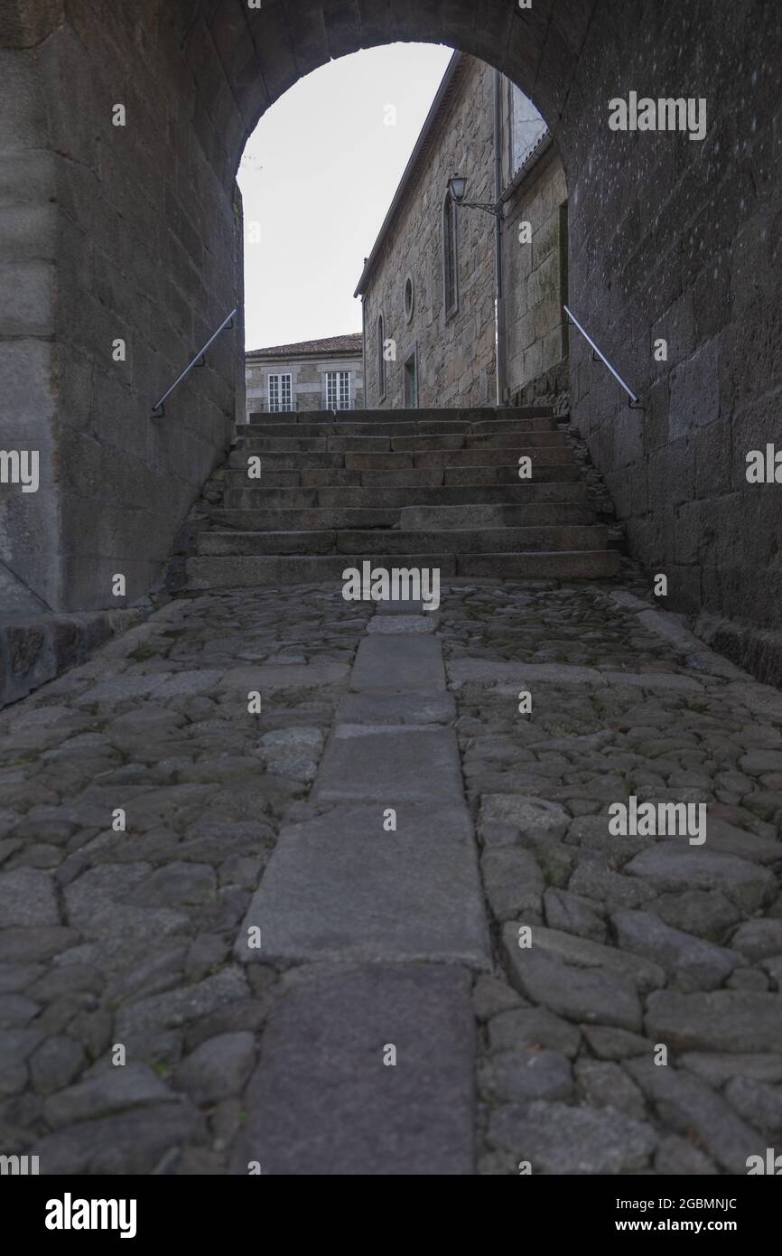 TUY, SPAIN - Jul 15, 2021: A narrow footpath and archway in Tuy, Spain ...