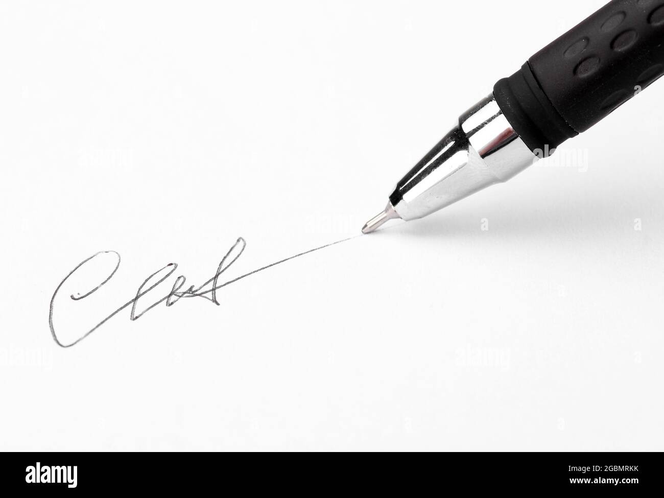 Closeup of signature (fake, not real) and pen, isolated on white Stock ...