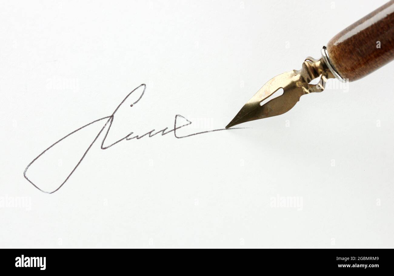 Closeup of signature (fake, not real) and ink pen, isolated on white ...