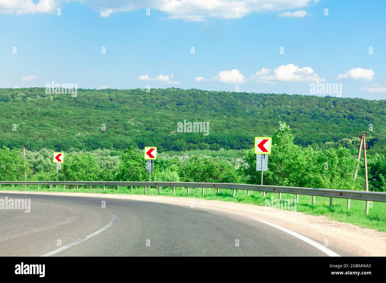 Winding road signs hi-res stock photography and images - Alamy