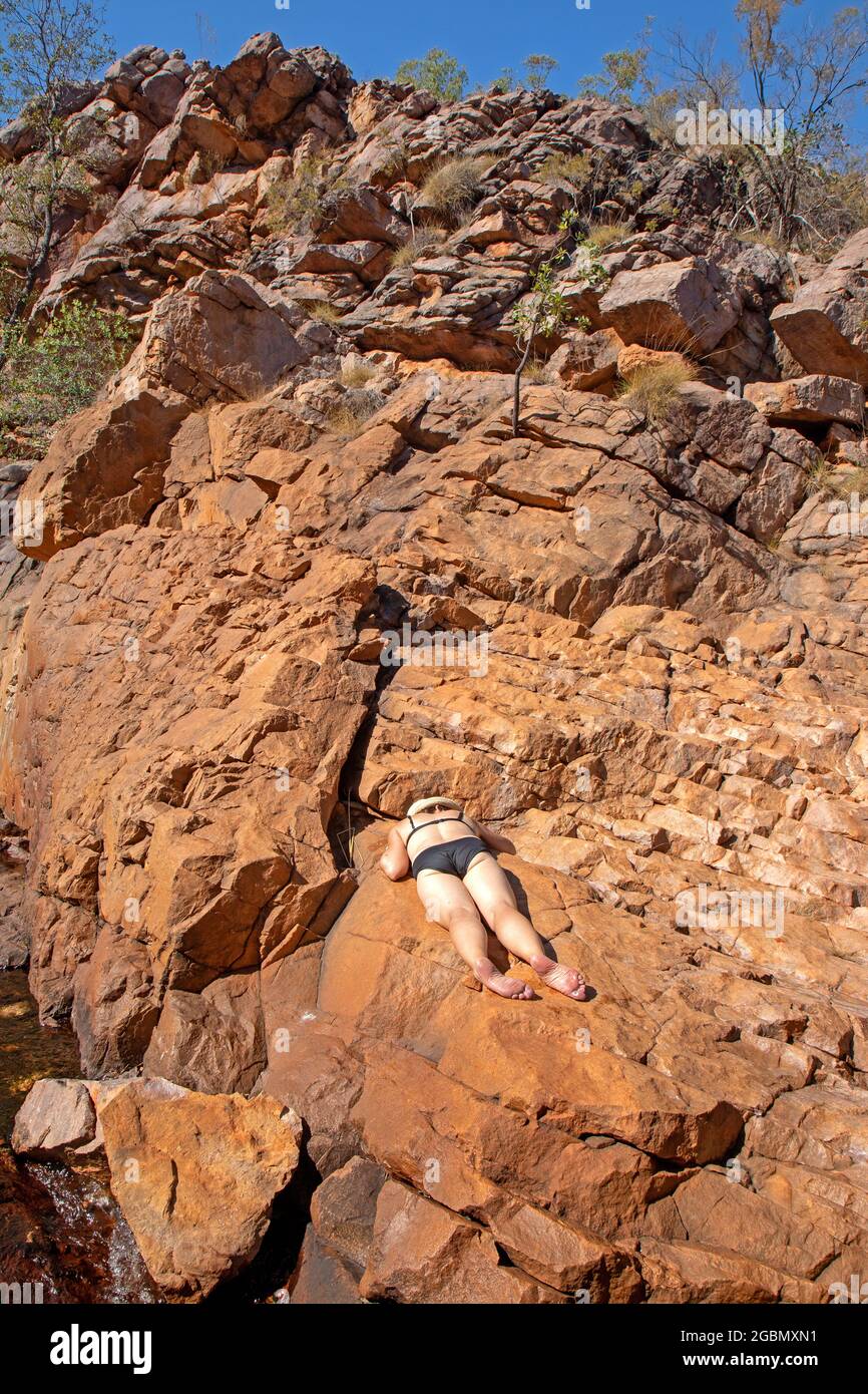 Woman lying in the sun hi-res stock photography and images - Alamy
