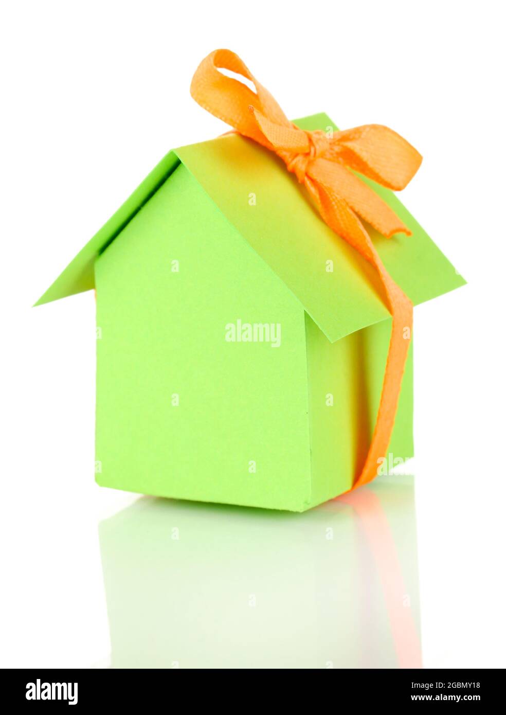 Small house with ribbon isolated on white Stock Photo - Alamy