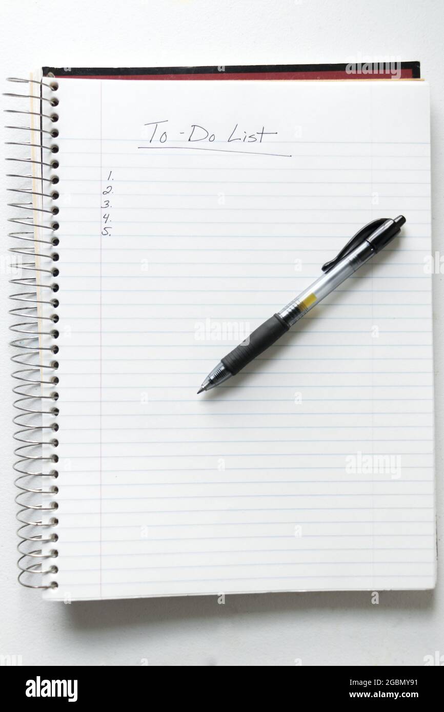 To-Do List in a spiral-bound notebook with a black pen Stock Photo - Alamy