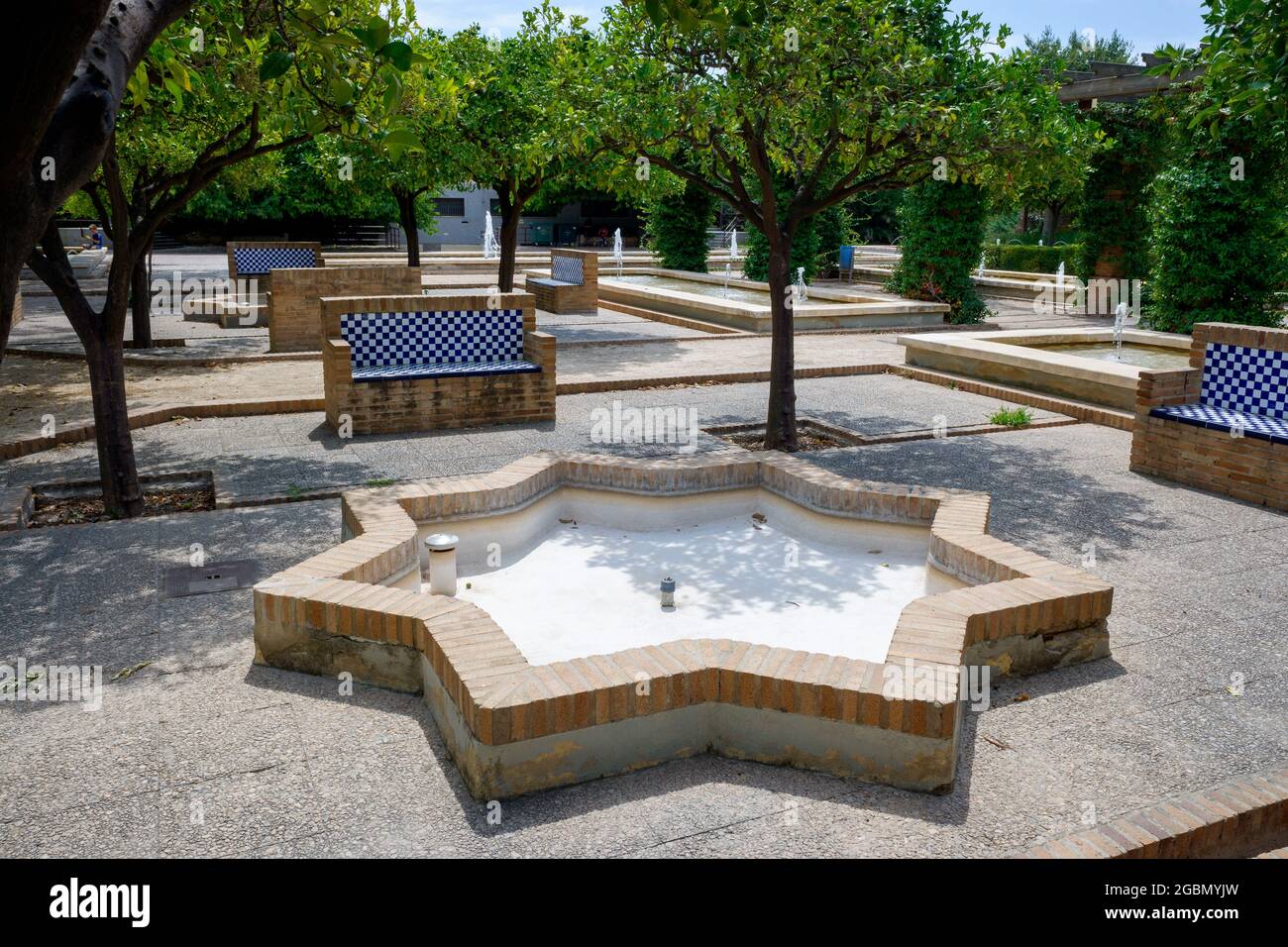 An empty public fountain dries up due to the drought shaped like an ...