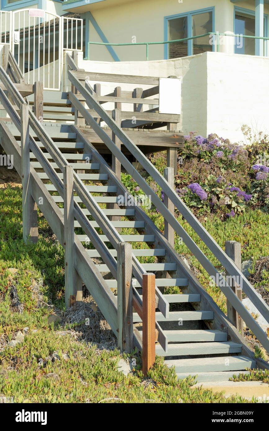 Vertical shot of wooden stairs at the beach Stock Photo - Alamy