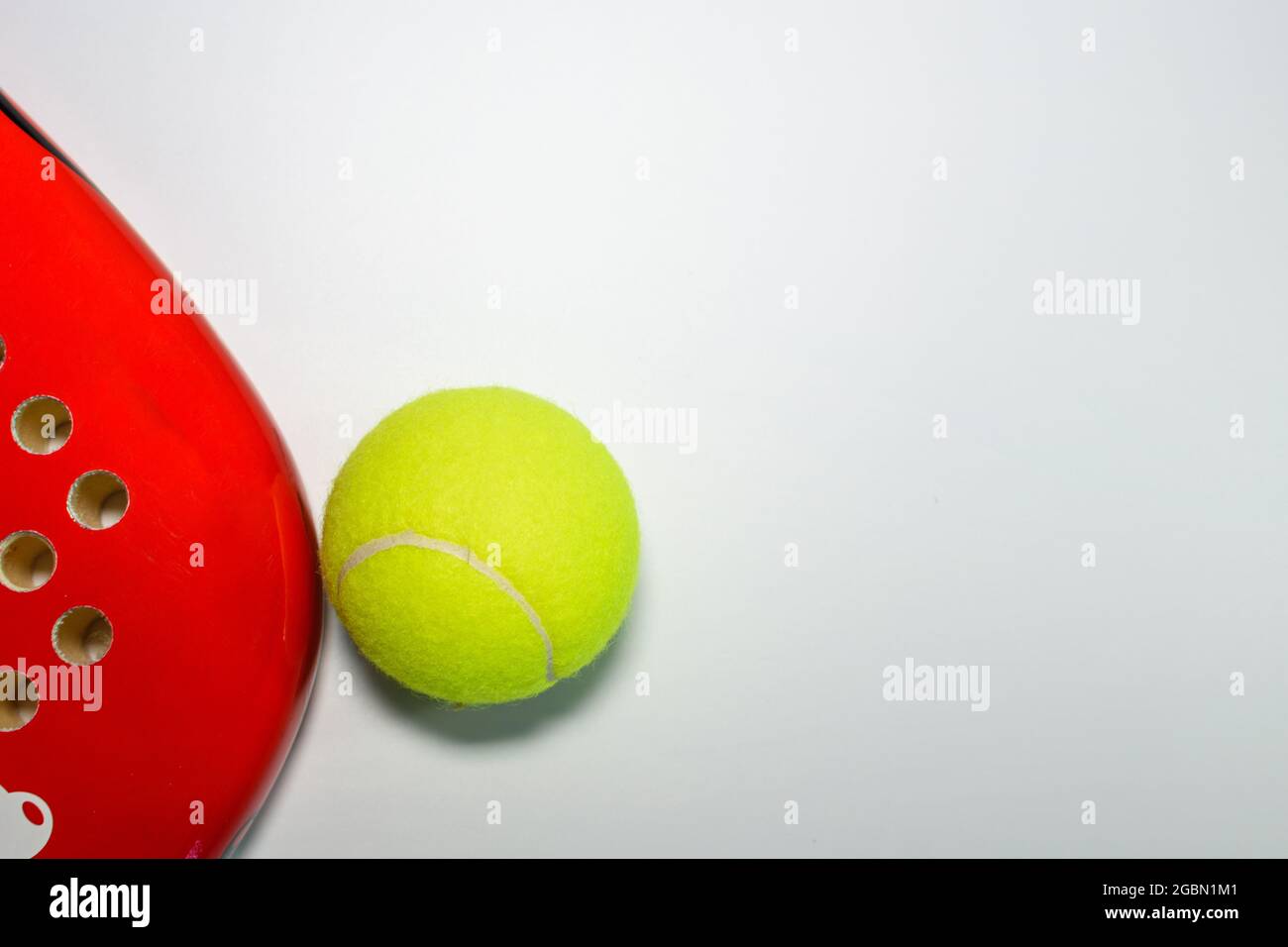 Paddle racket and paddle ball on white background Stock Photo - Alamy