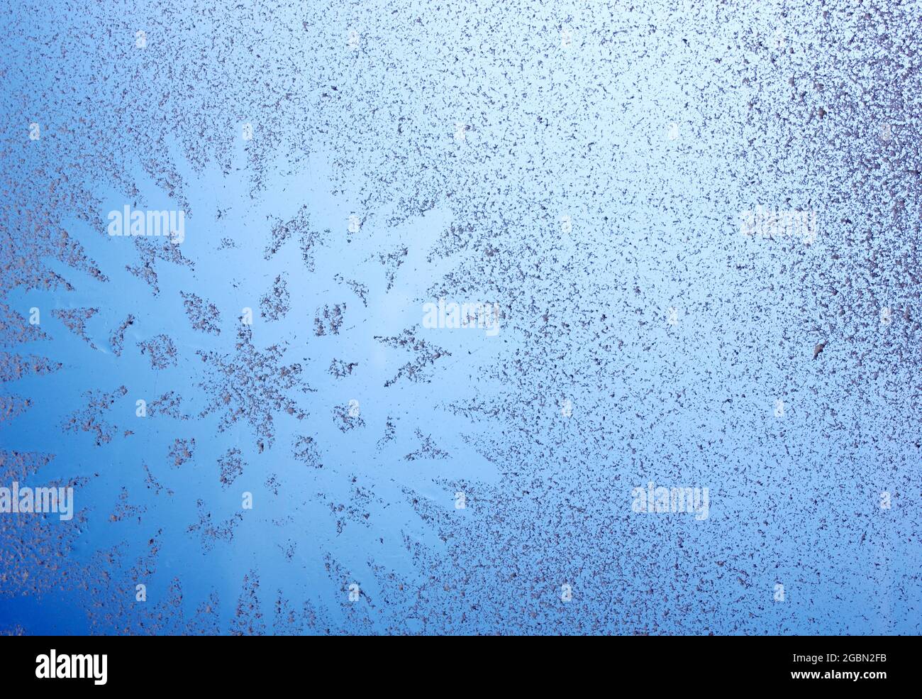 Snowflake pattern on window Stock Photo - Alamy