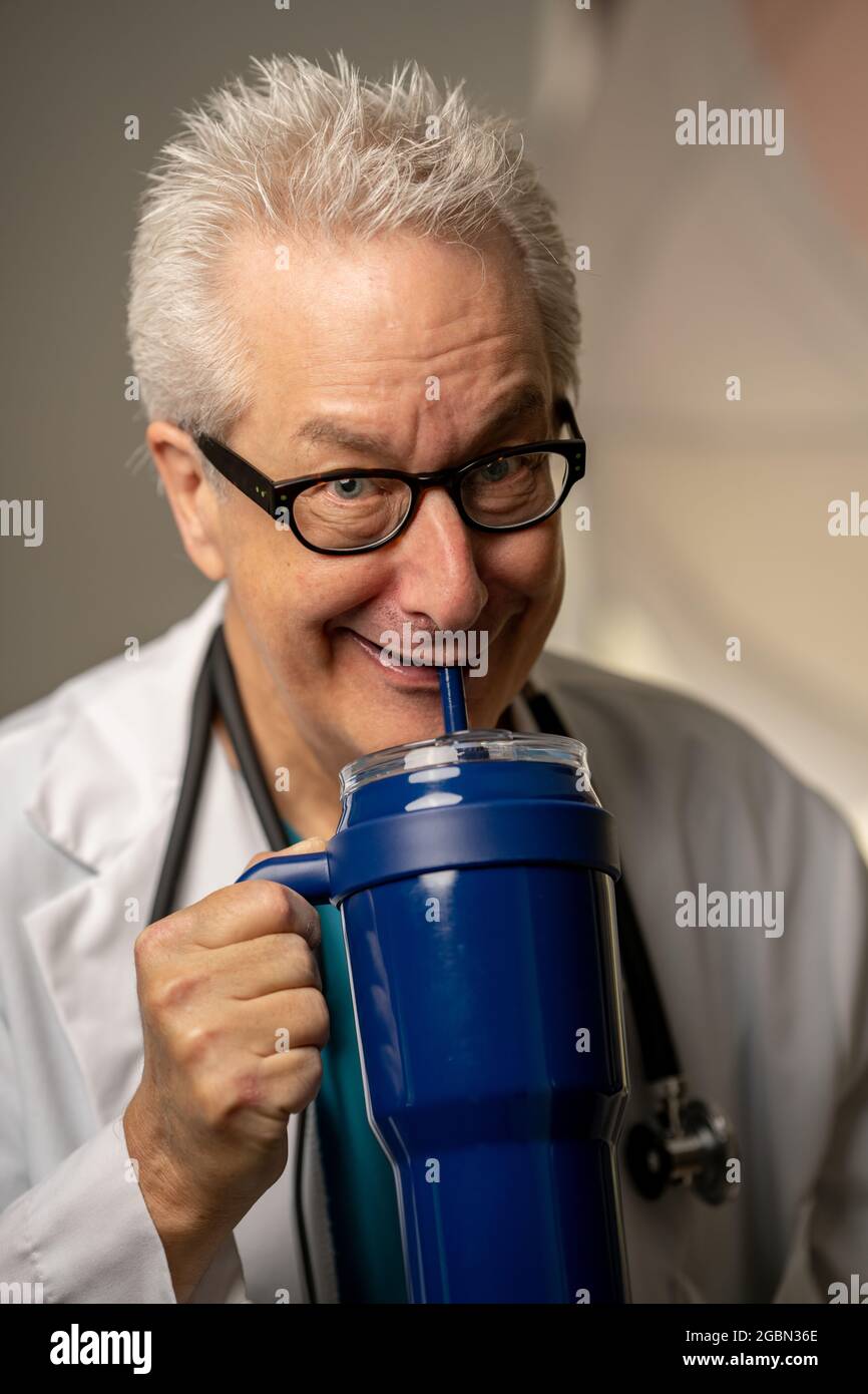 Doctor drinking water hi-res stock photography and images - Alamy