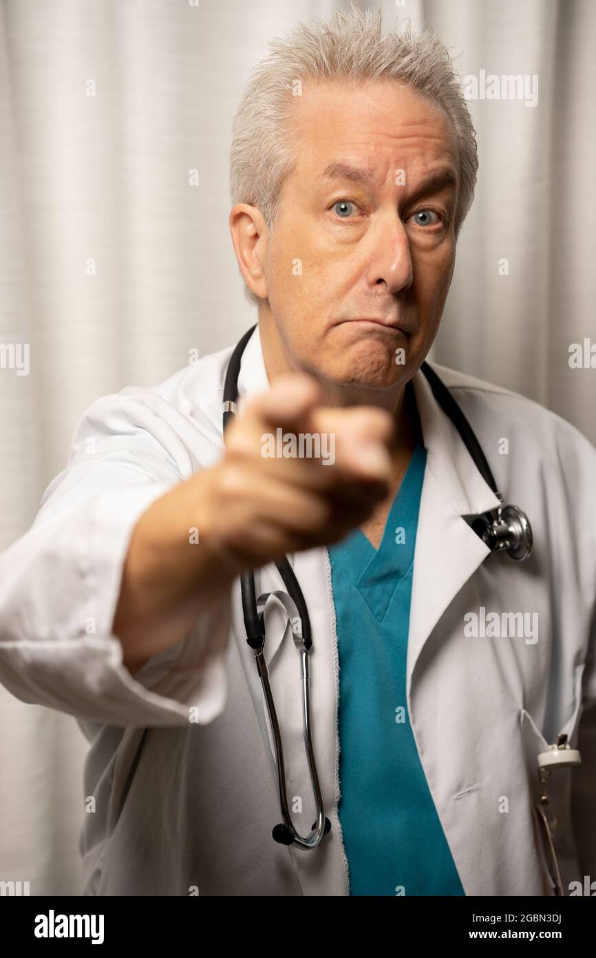 Photo of a doctor pointing his finger at you Stock Photo - Alamy