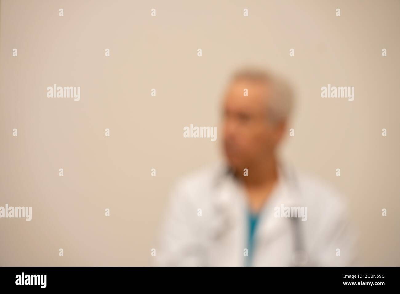 Photo of a blurry doctor looking sideways Stock Photo - Alamy