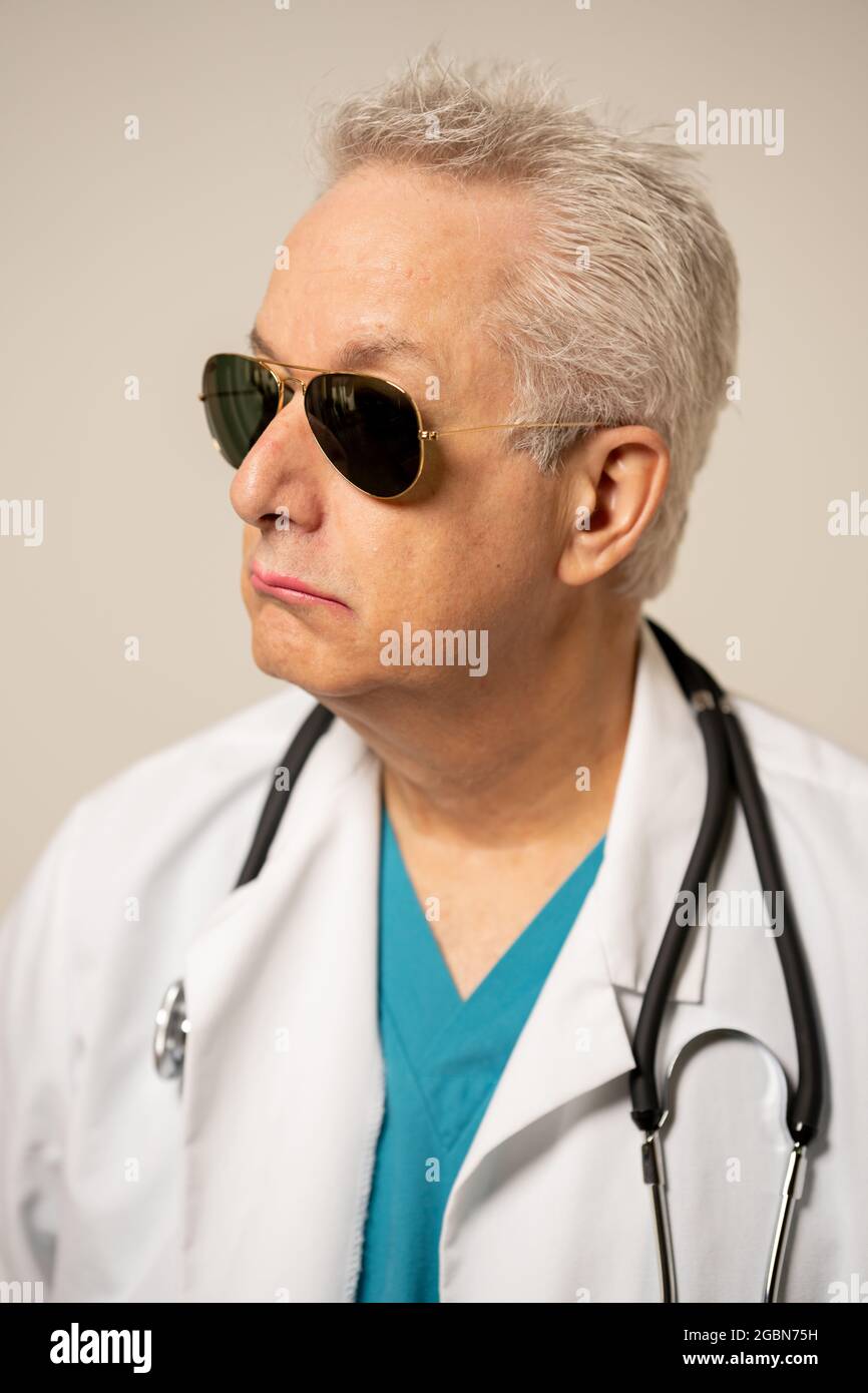 Transgender LGBT doctor wearing cool sunglasses and pink lipstick Stock ...