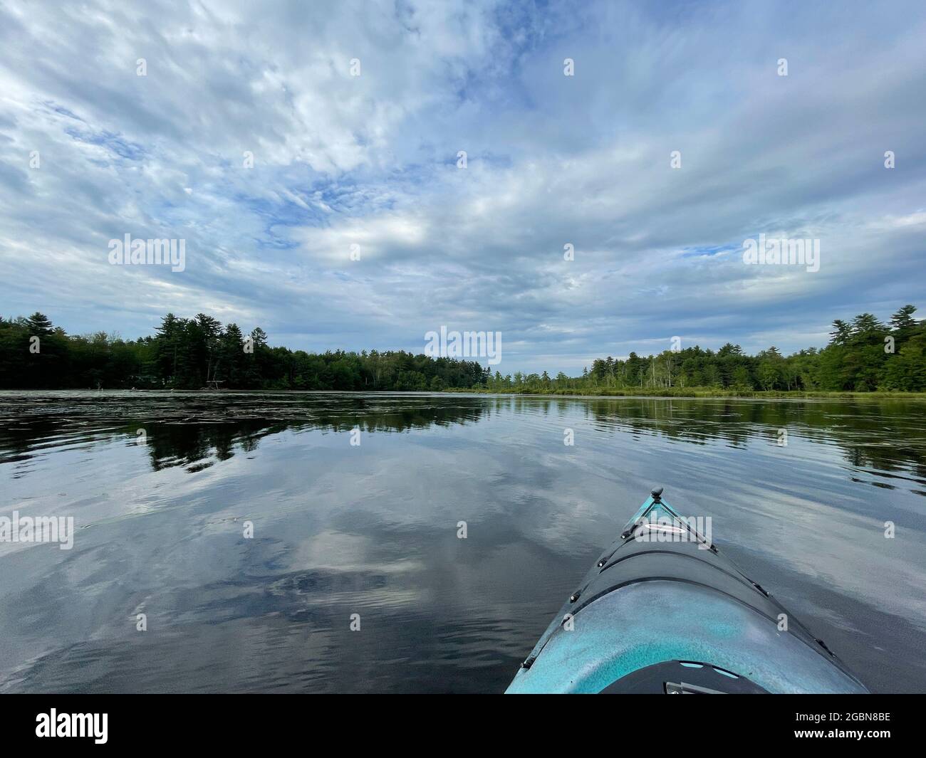 Kayaking on calm lake Stock Photo - Alamy