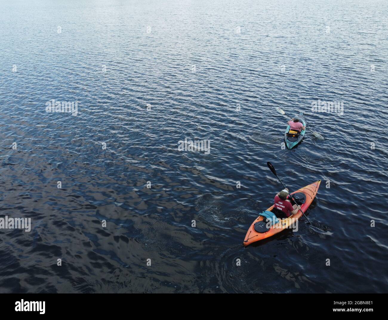 Kayaking on lake Stock Photo - Alamy