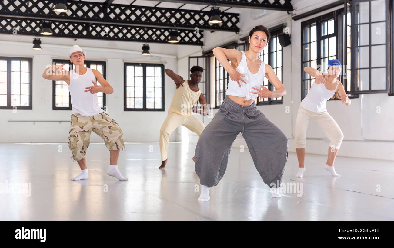 Team of dancers performing hip-hop dance Stock Photo - Alamy