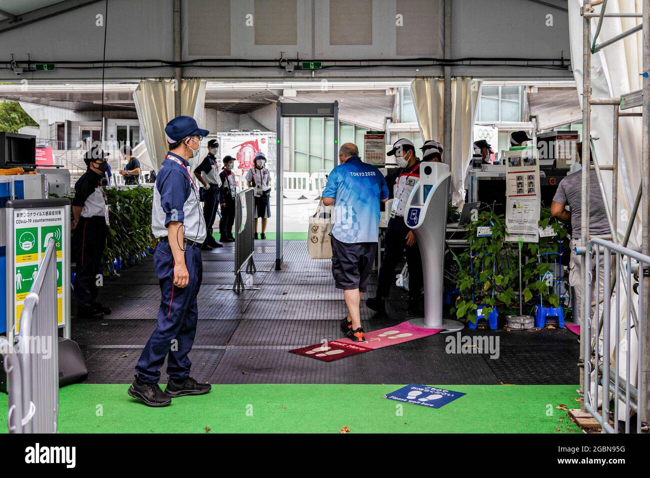 Security personnel seen at the access to the Tokyo National Olympic ...