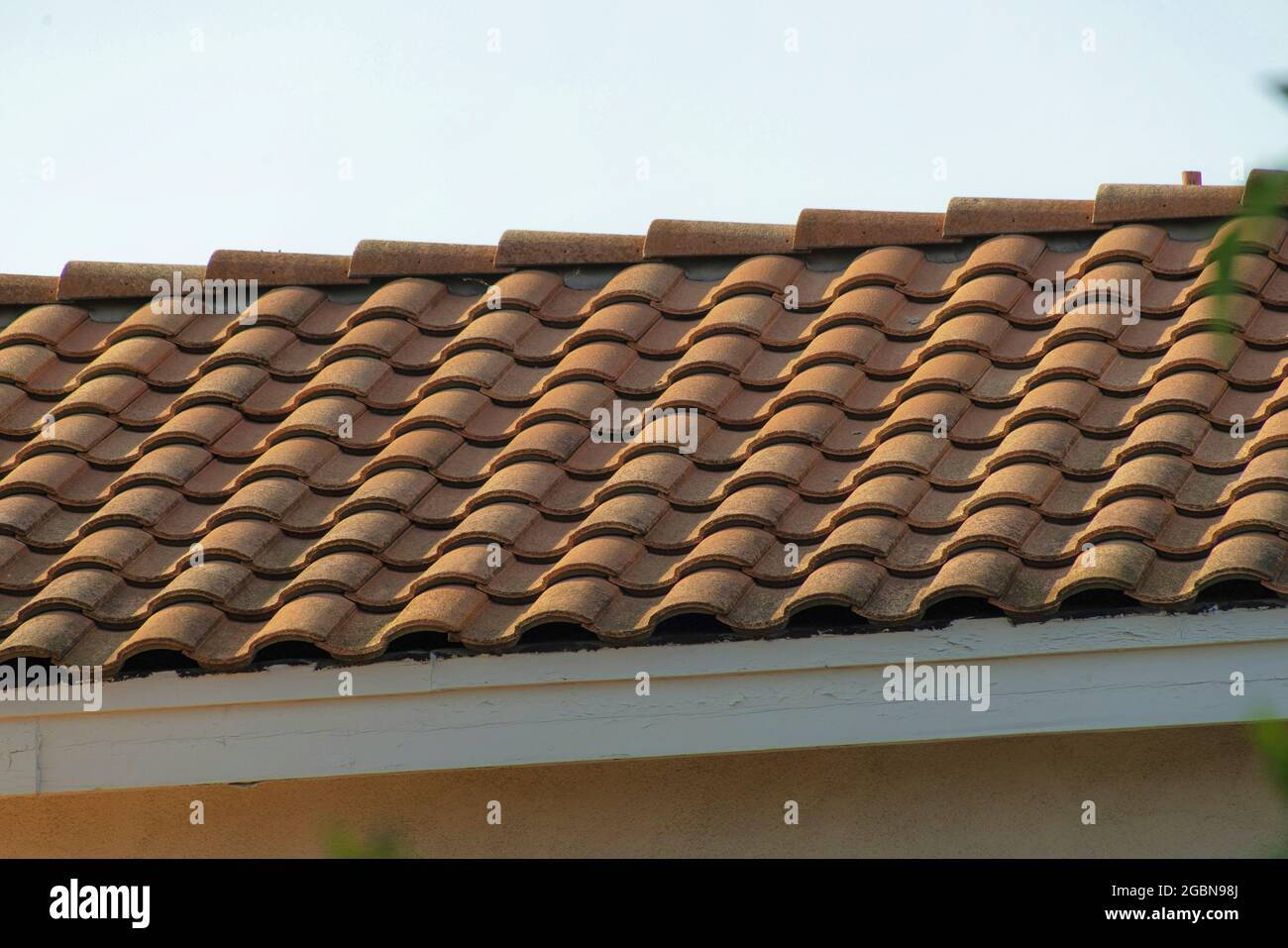 Closeup of tile roof of a modern house in an urban area Stock Photo - Alamy