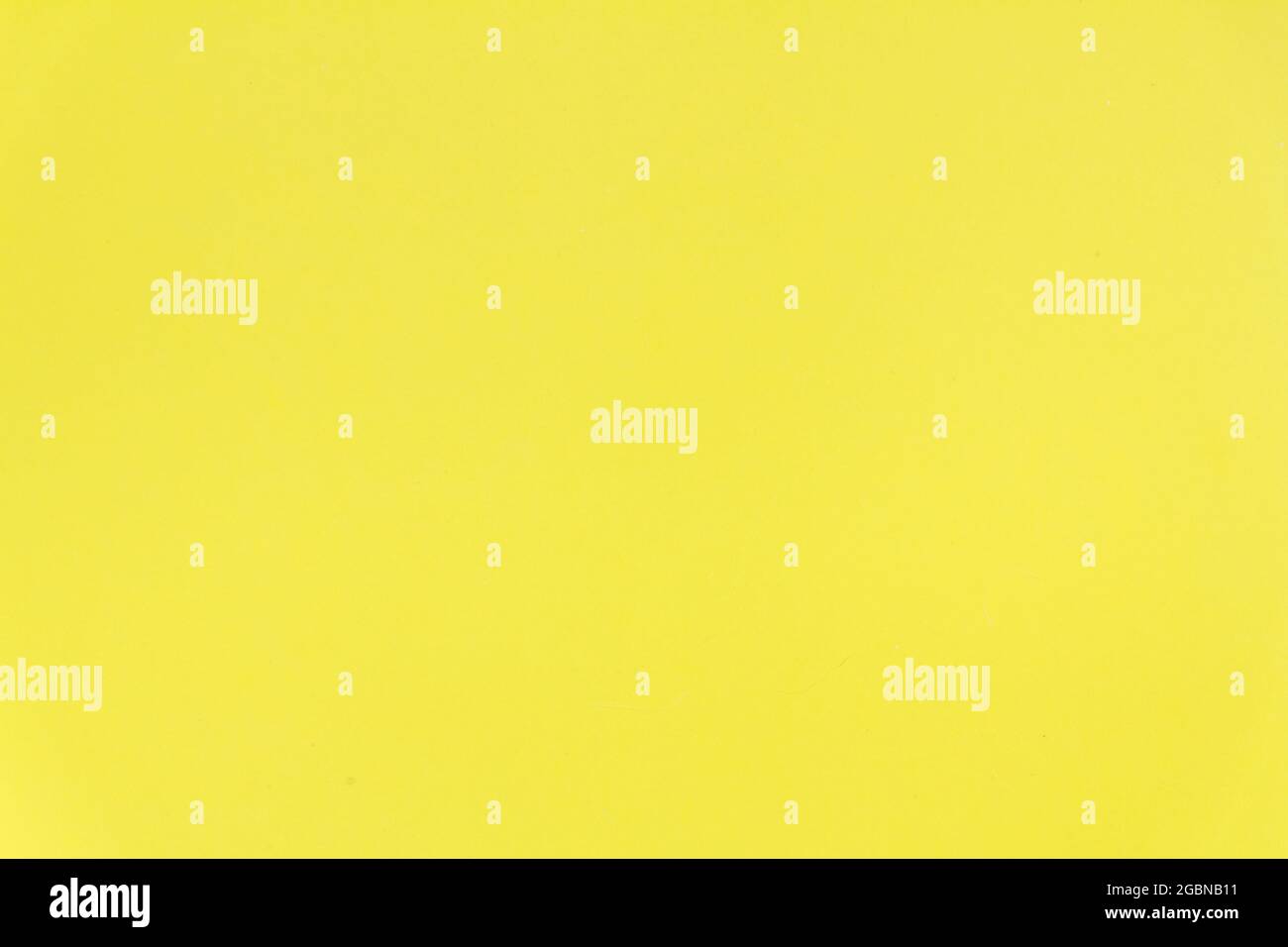 Yellow paper background and free space for text Stock Photo - Alamy