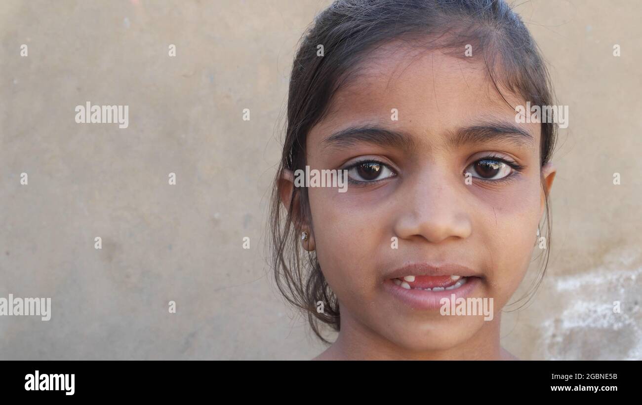 Cute Indian kid standing outdoor Stock Photo - Alamy