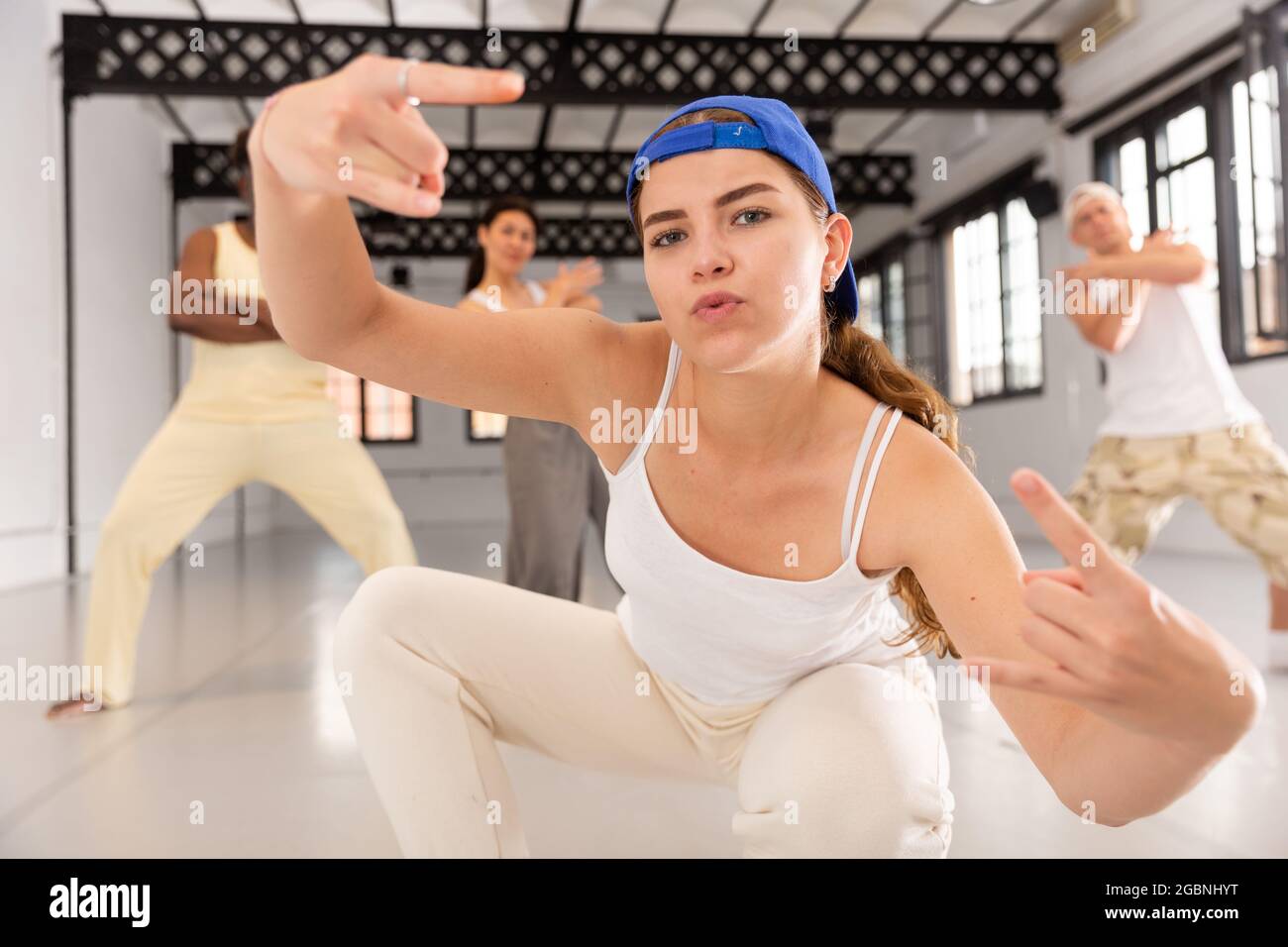 Young beautiful female dancer enjoying dancing break dance Stock Photo ...