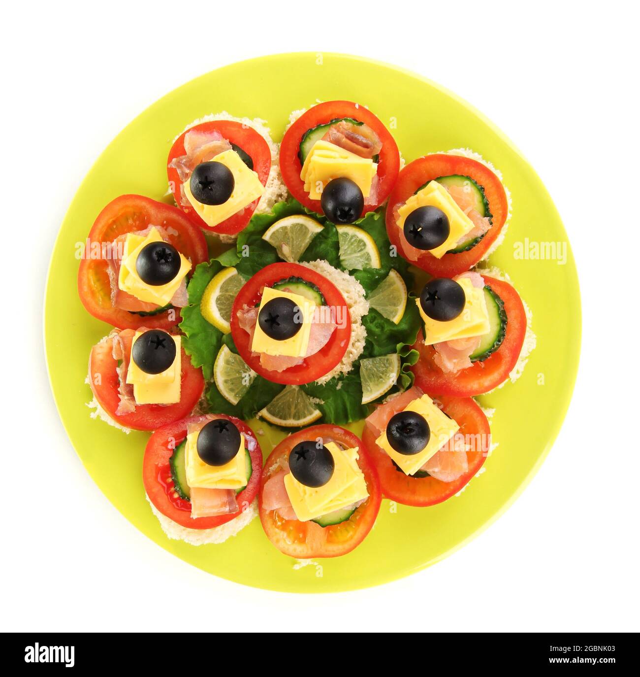 Canapes on plate isolated on white Stock Photo - Alamy