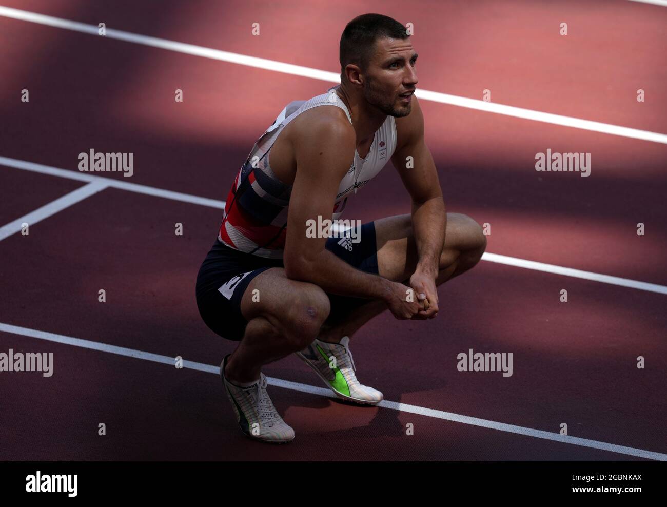 Great Britain's Andrew Pozzi appears dejected after failing to win a ...