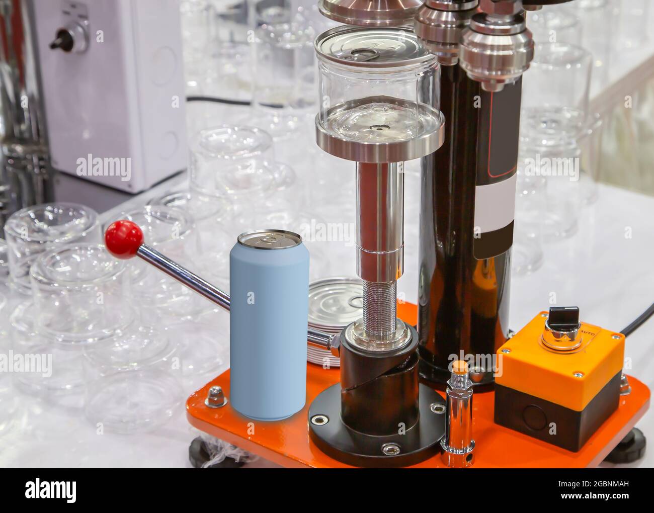 Can sealing machine hi-res stock photography and images - Alamy