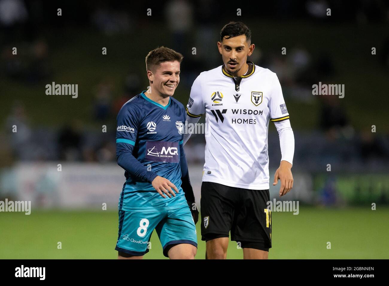 Cameron Devlin of Wellington Phoenix smiles with Moudi Najjar of ...