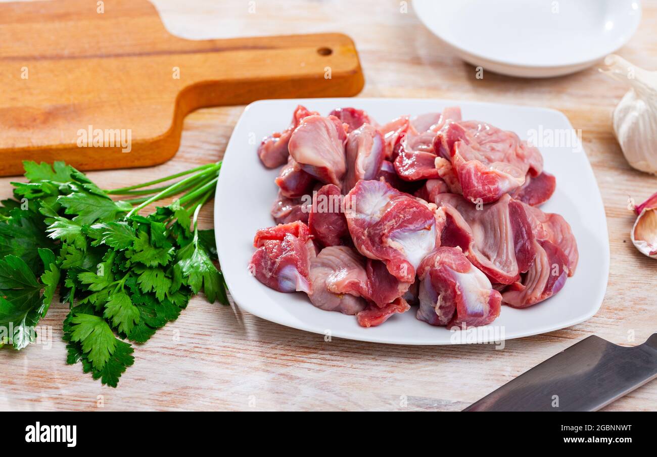 Raw turkey gizzards on hi-res stock photography and images - Alamy