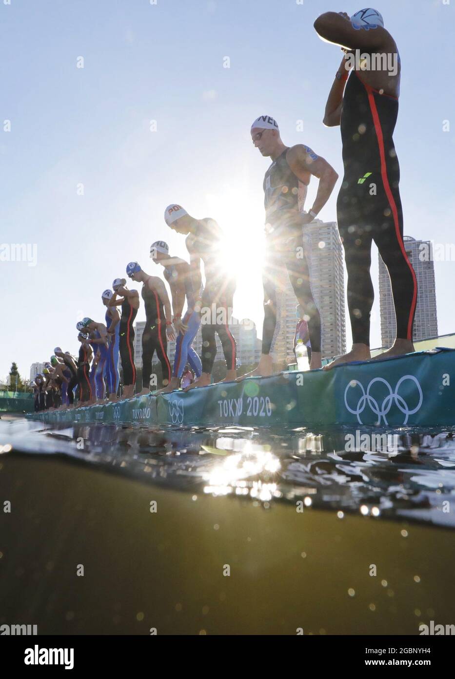 Swimmers line up ahead of the start of the men's 10-kilometer marathon ...