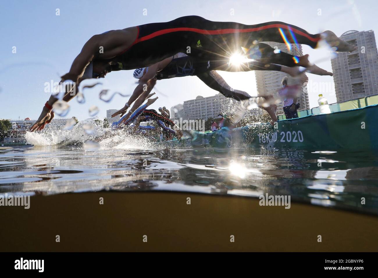 Swimmers make a start in the men's 10-kilometer marathon swimming at ...