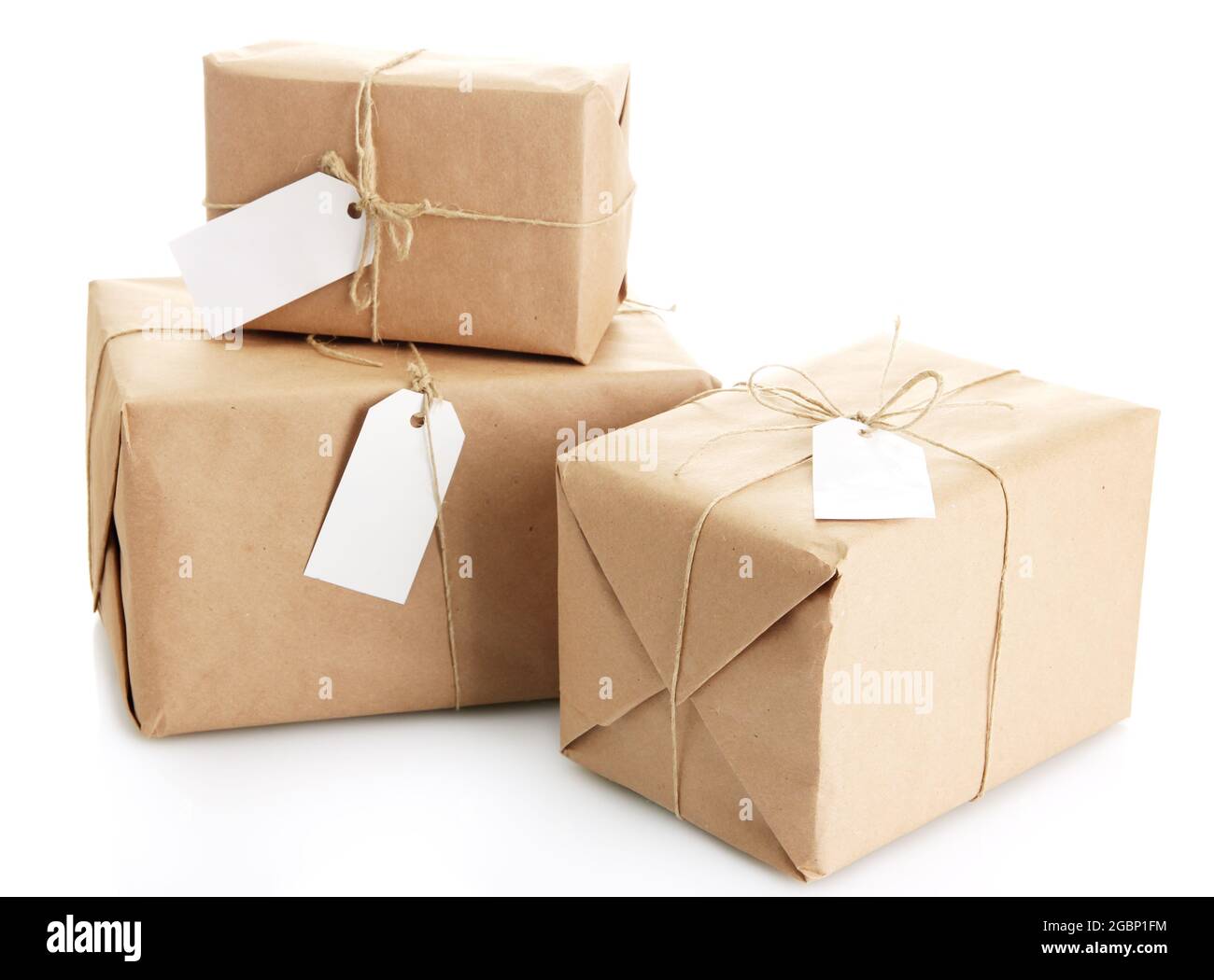 parcels boxes with kraft paper, isolated on white Stock Photo - Alamy