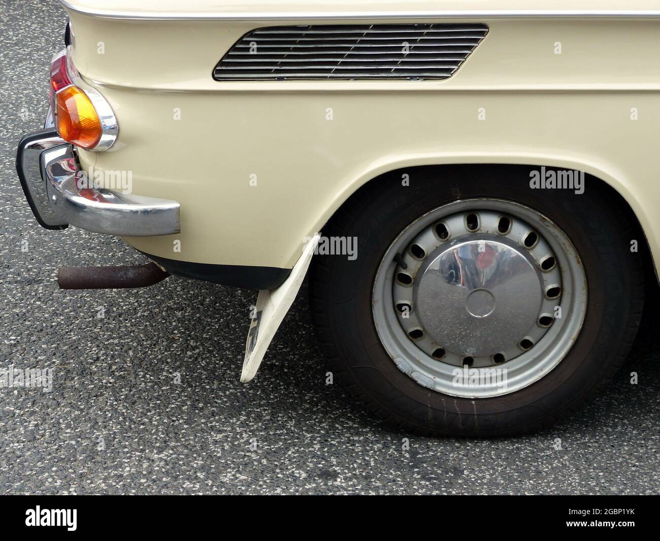 Small classic beige car with rear engine Stock Photo - Alamy