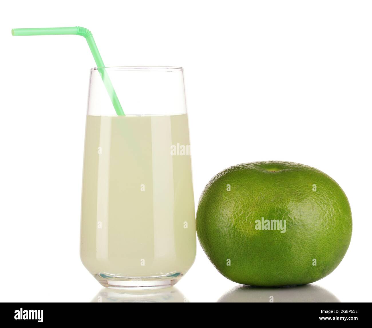 Delicious sweetie juice in glass and sweetie next to it isolated on ...