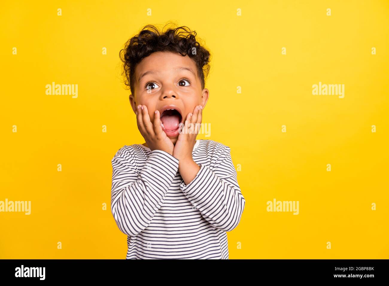 Child touching mouth happy isolated hi-res stock photography and images ...