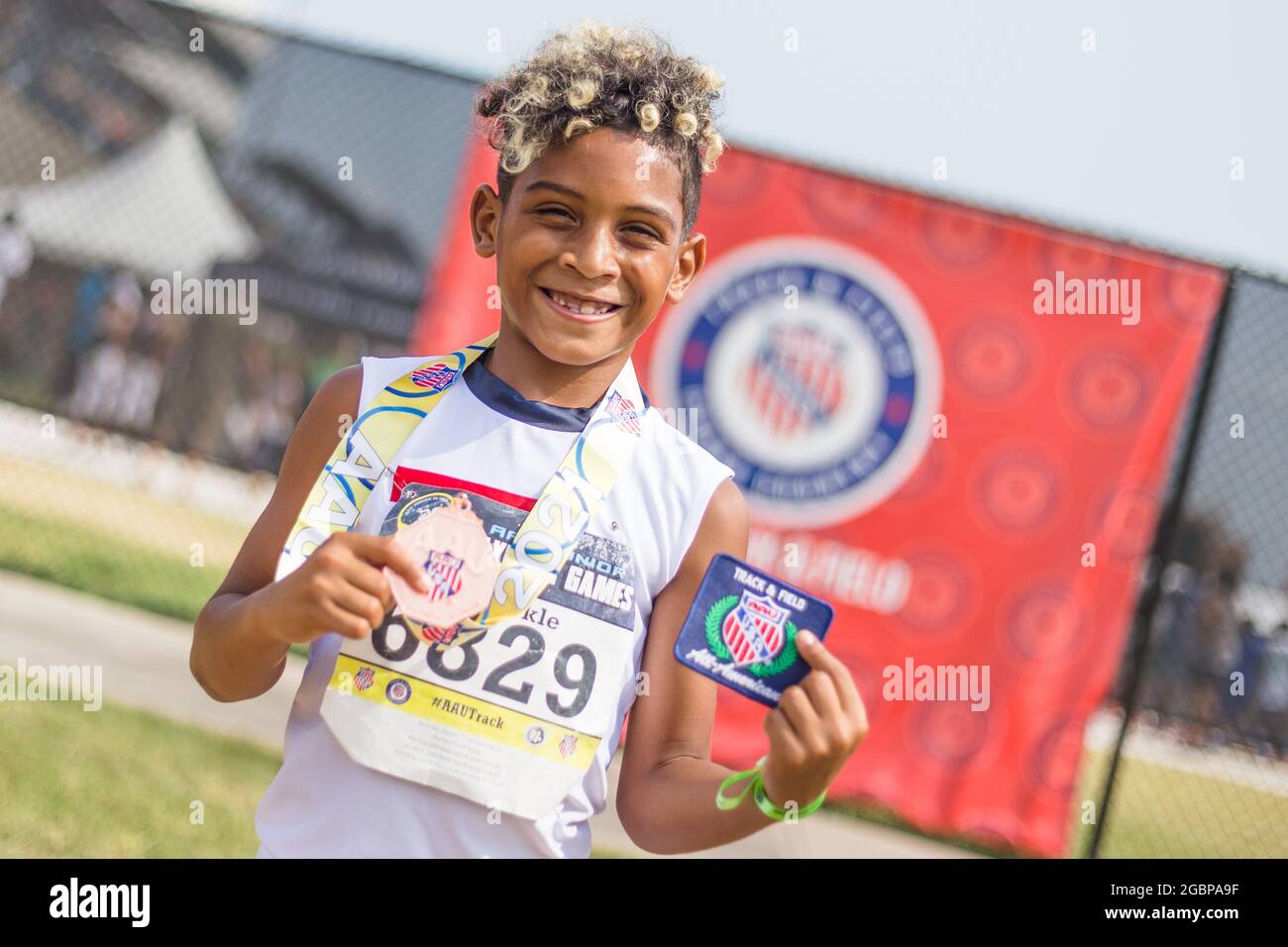 August 4, 2021: Braylon McCorkle holds his medal and patch after ...