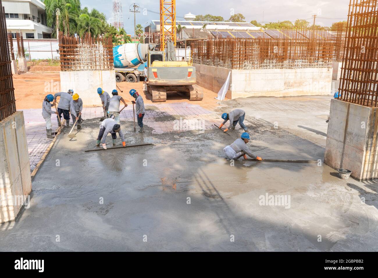 Group of Construction worker with excavator heavy machine and cement ...