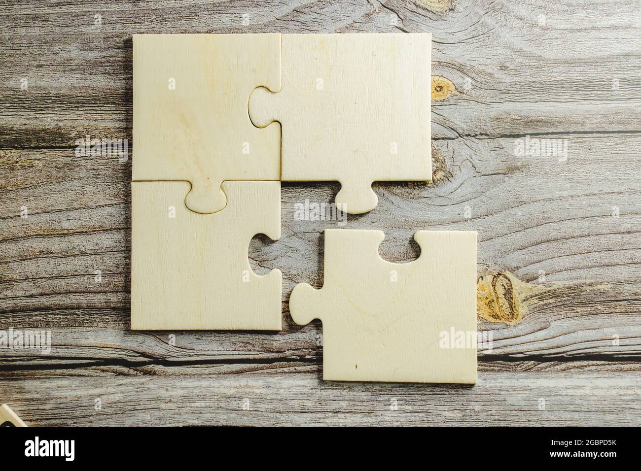 White jigsaw puzzle connecting together. Team business success ...