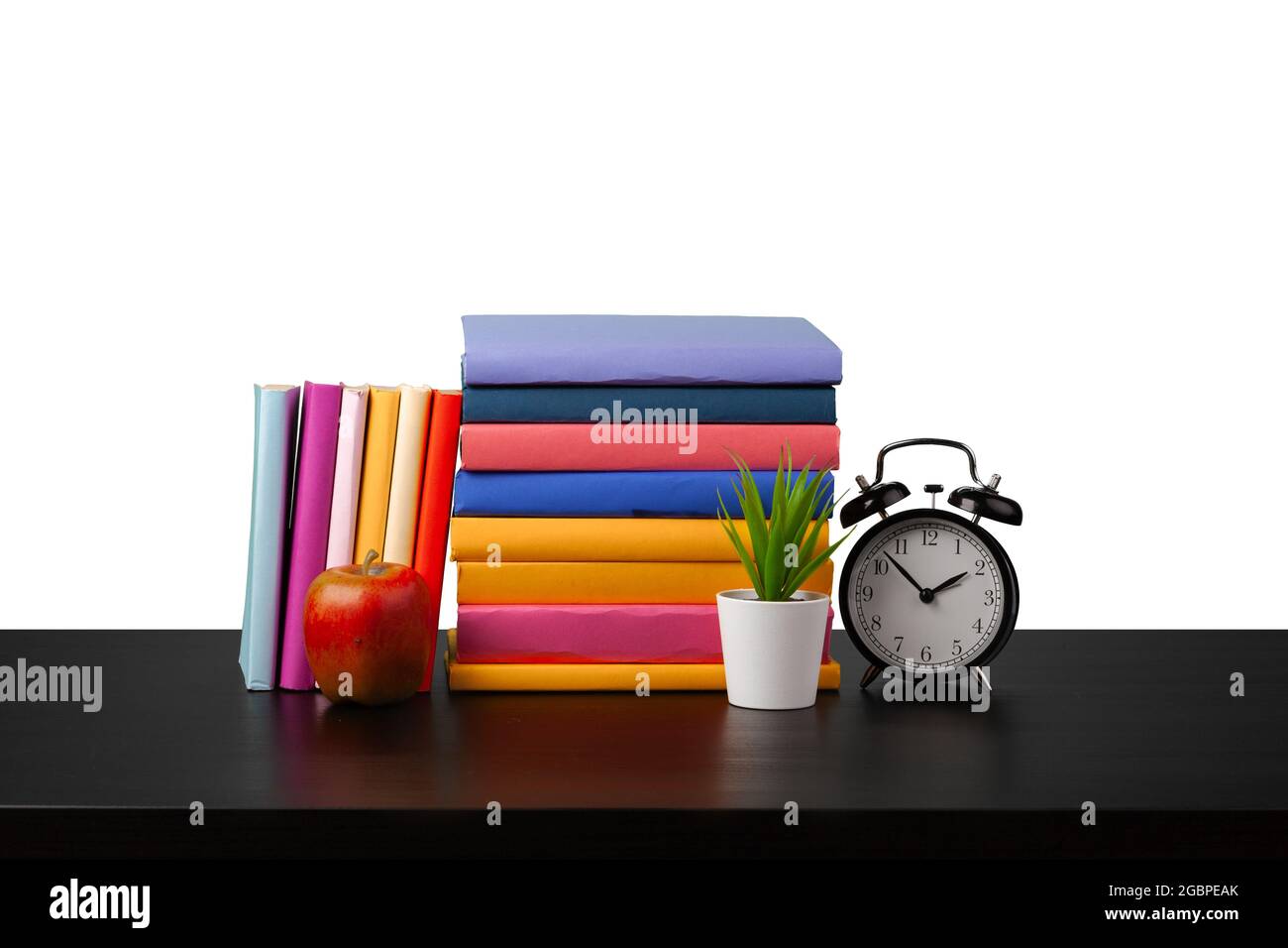 Stack of books and alarm clock, time to read concept Stock Photo - Alamy