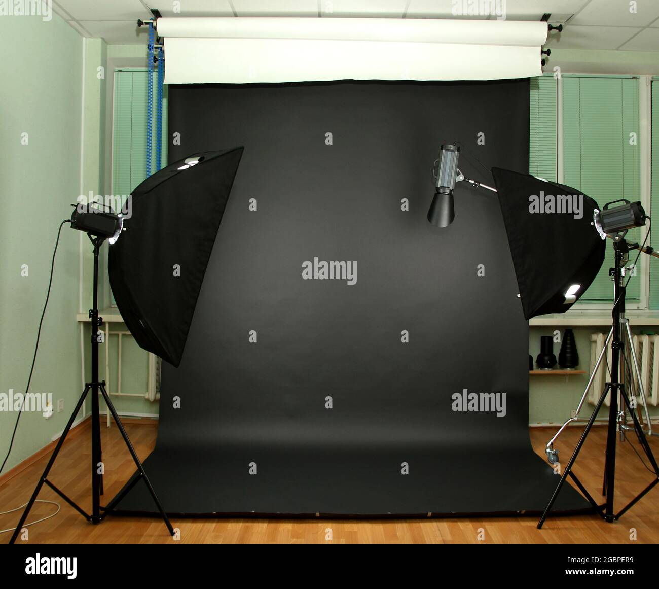 Empty photo studio with lighting equipment Stock Photo - Alamy