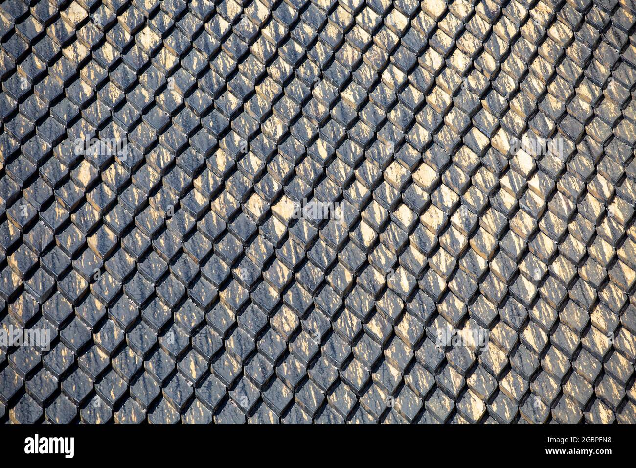 Church roof made of tarred wood. Abstract background Stock Photo - Alamy
